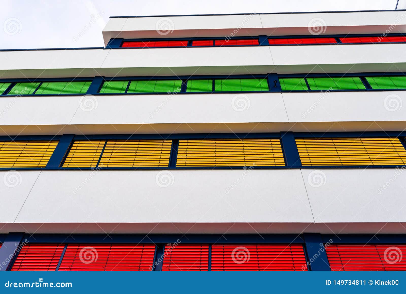 Elevation of a Modern Office Building with Different Colors of Blinds ...