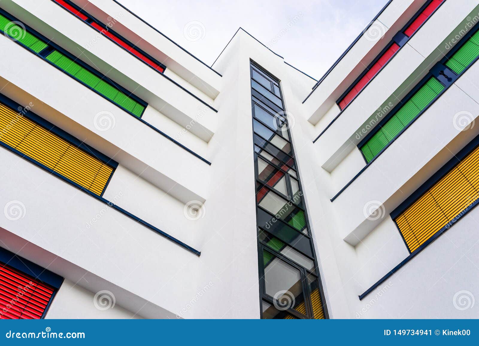 Elevation of a Modern Office Building with Different Colors of Blinds ...