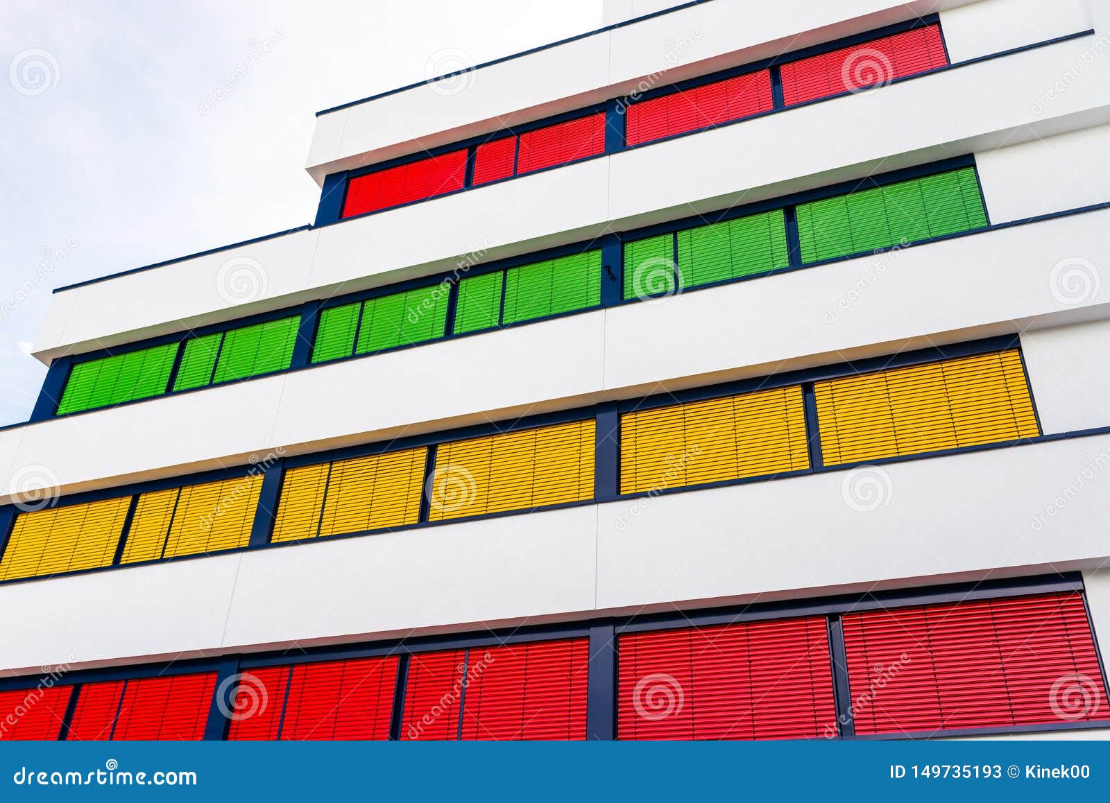 Elevation of a Modern Office Building with Different Colors of Blinds ...