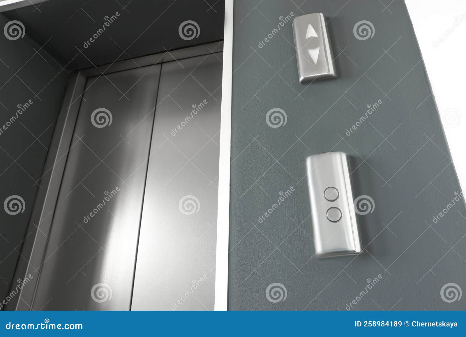 Elevator Call Buttons on Grey Wall Near Door Stock Image - Image of ...