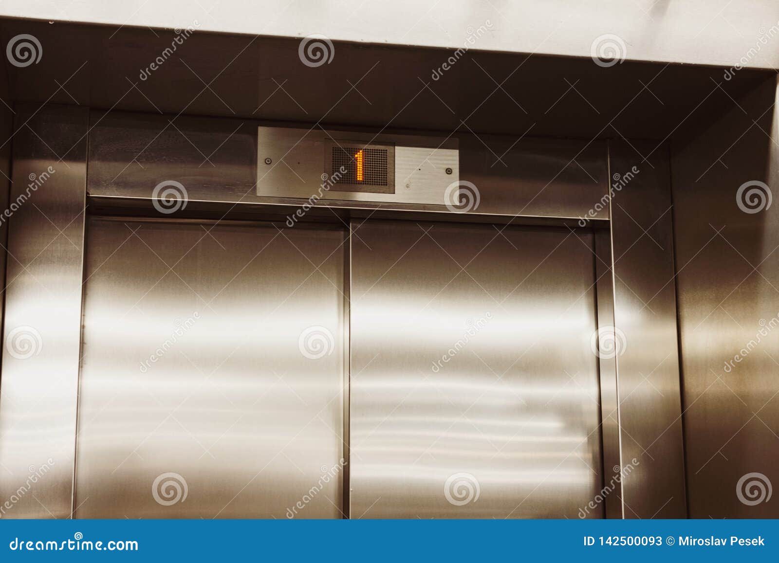 Closed Door of the Lift. Elevator on the First Floor. Stock Image ...