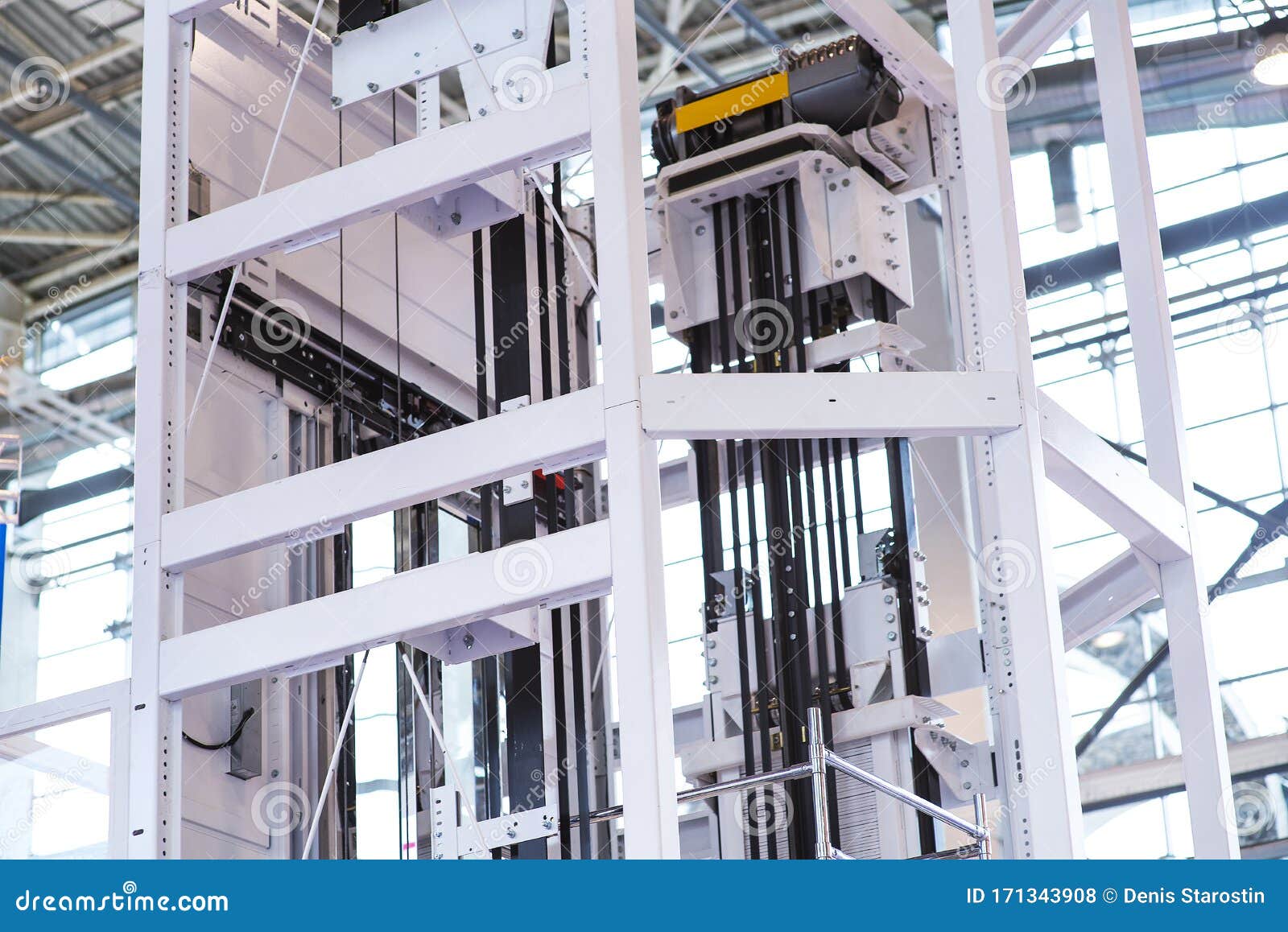 Elevator Installation, Lift Technician Installing a Modern Elevator ...