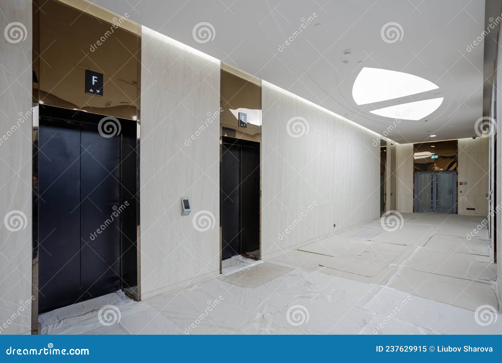 Elevator Installation, Lift Technician Installing a Modern Elevator ...
