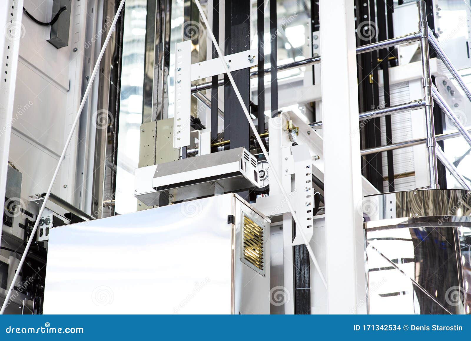 Elevator Installation, Lift Technician Installing a Modern Elevator ...