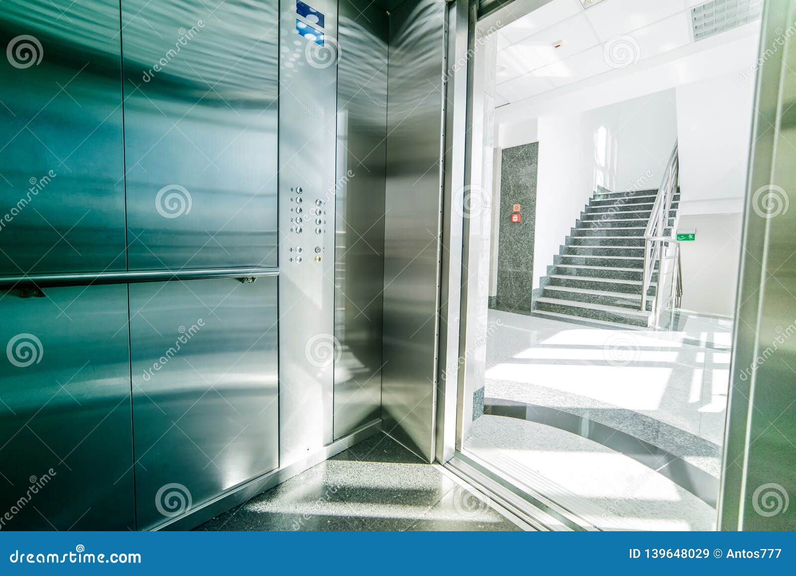 An Elevator Interior Transformed Into A Cozy Library, With She Royalty ...