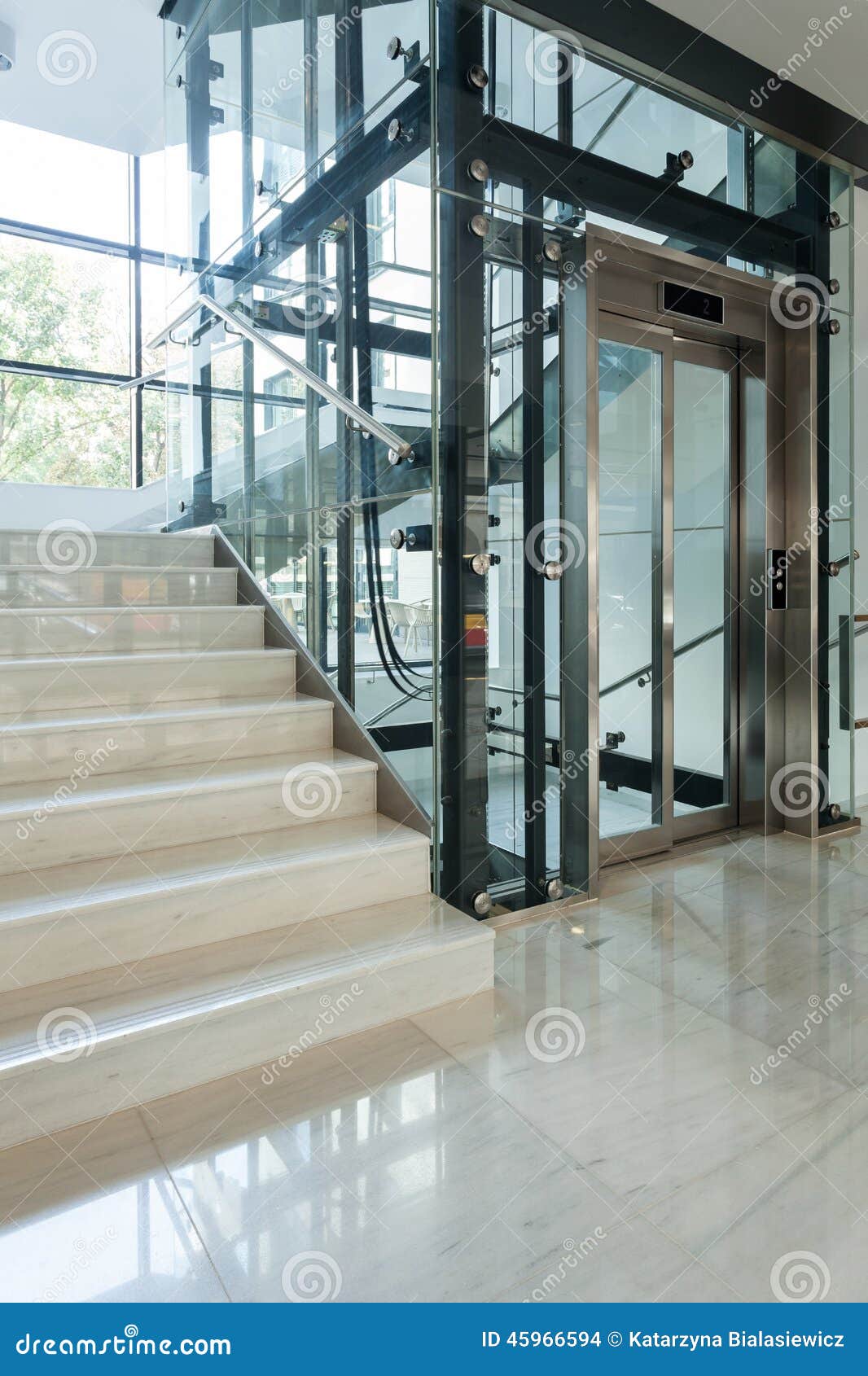 Elevator Next To Staircase Stock Photo - Image: 45966594
