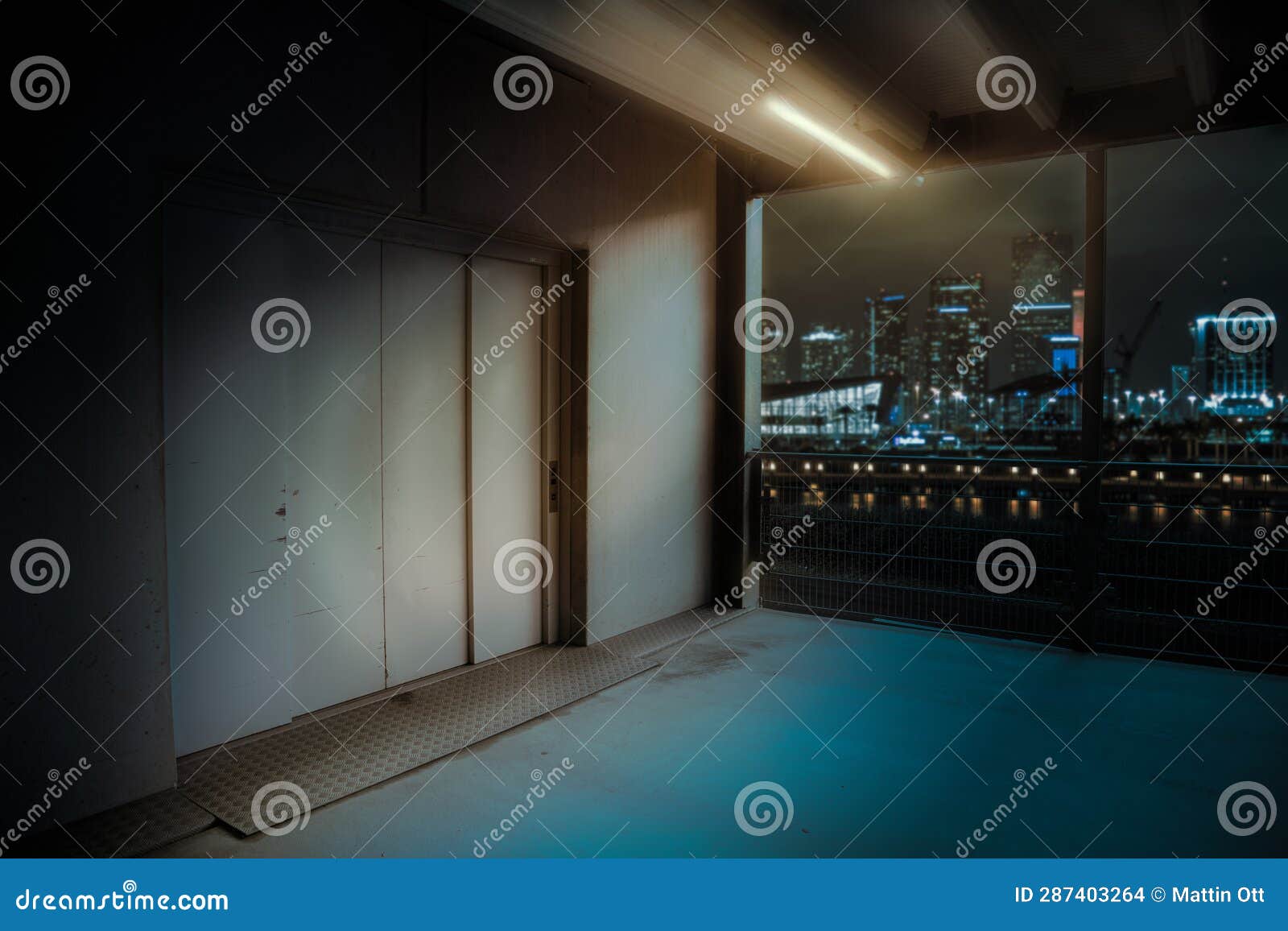 Elevator at Parking Garage at Night Outside with Lamp Shine at Closed ...