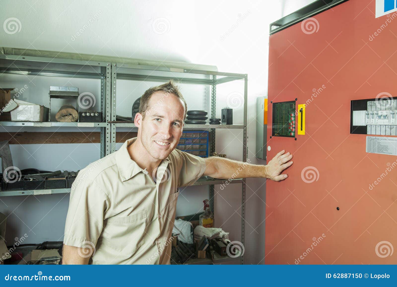 Elevator Repair Man at Work Stock Photo - Image of machinery, checking ...