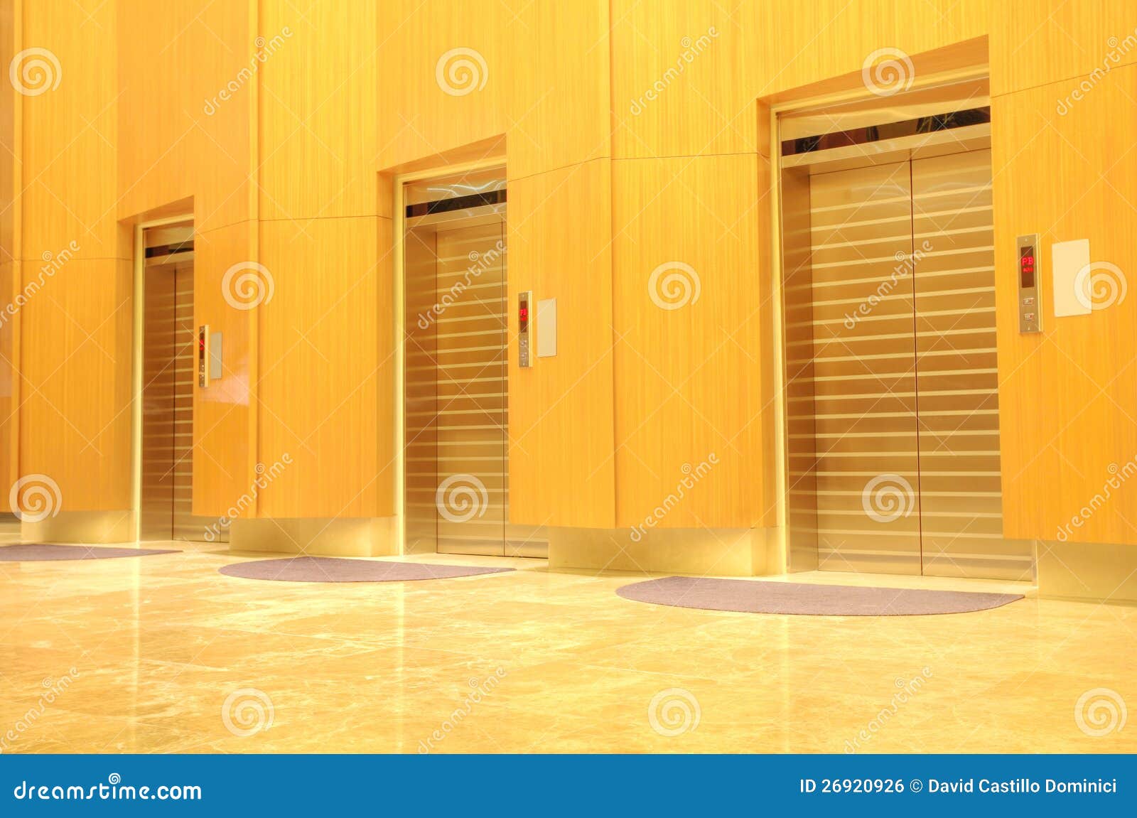 Three Elevator Doors In A Residential Building. Wide-angle View Of ...