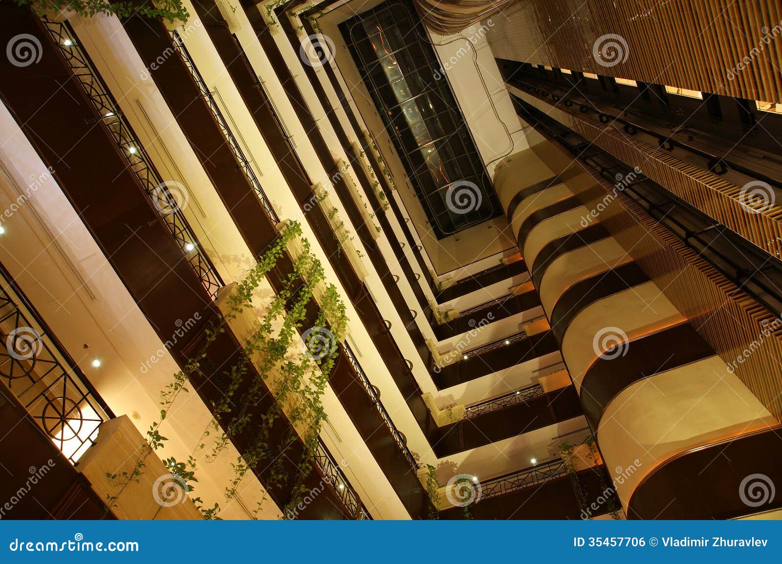 Elevators in Atrium of Hotel Stock Photo - Image of indoors, door: 35457706
