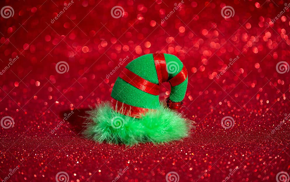 Elf Cap on a Red Shiny Background. Card Stock Image - Image of ...