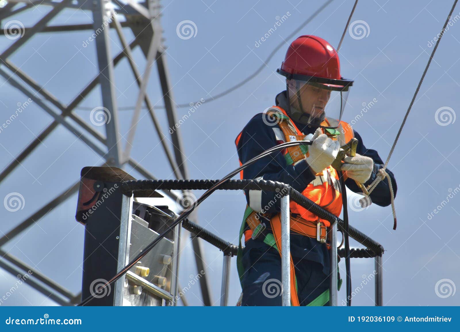 Power Engineer In The Cradle Of The Lift Car Near The Wires Editorial ...