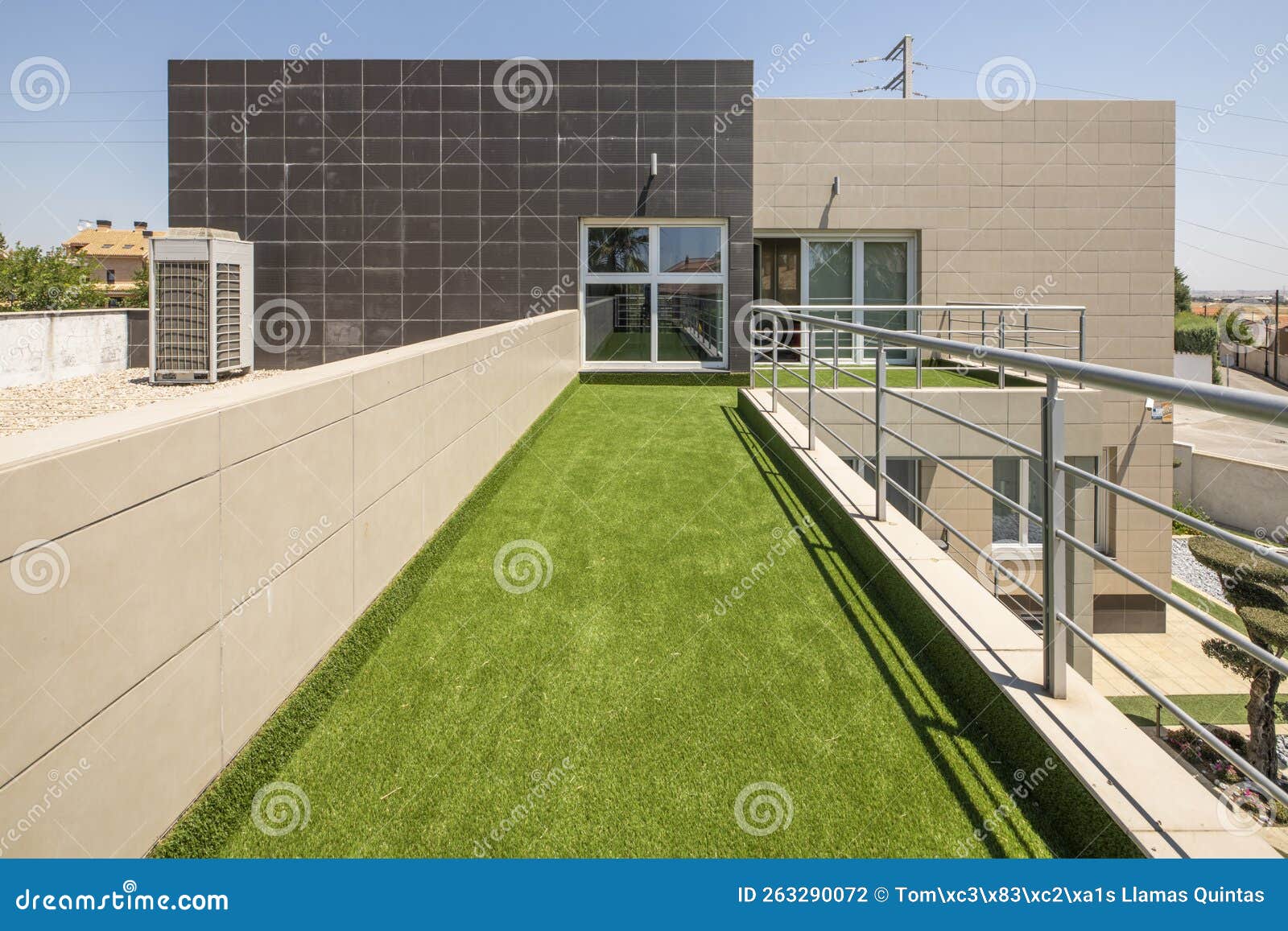Elongated Terrace in the Shape of an L Covered with Artificial Grass ...