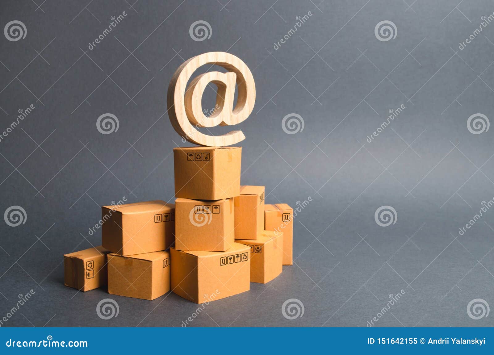 The Email Symbol Commercial at is on Cardboard Boxes Stack. E-commerce ...