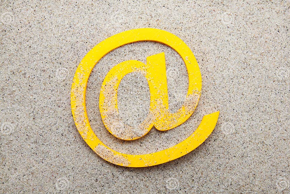 Email symbol in the sand stock image. Image of mailing - 39635631