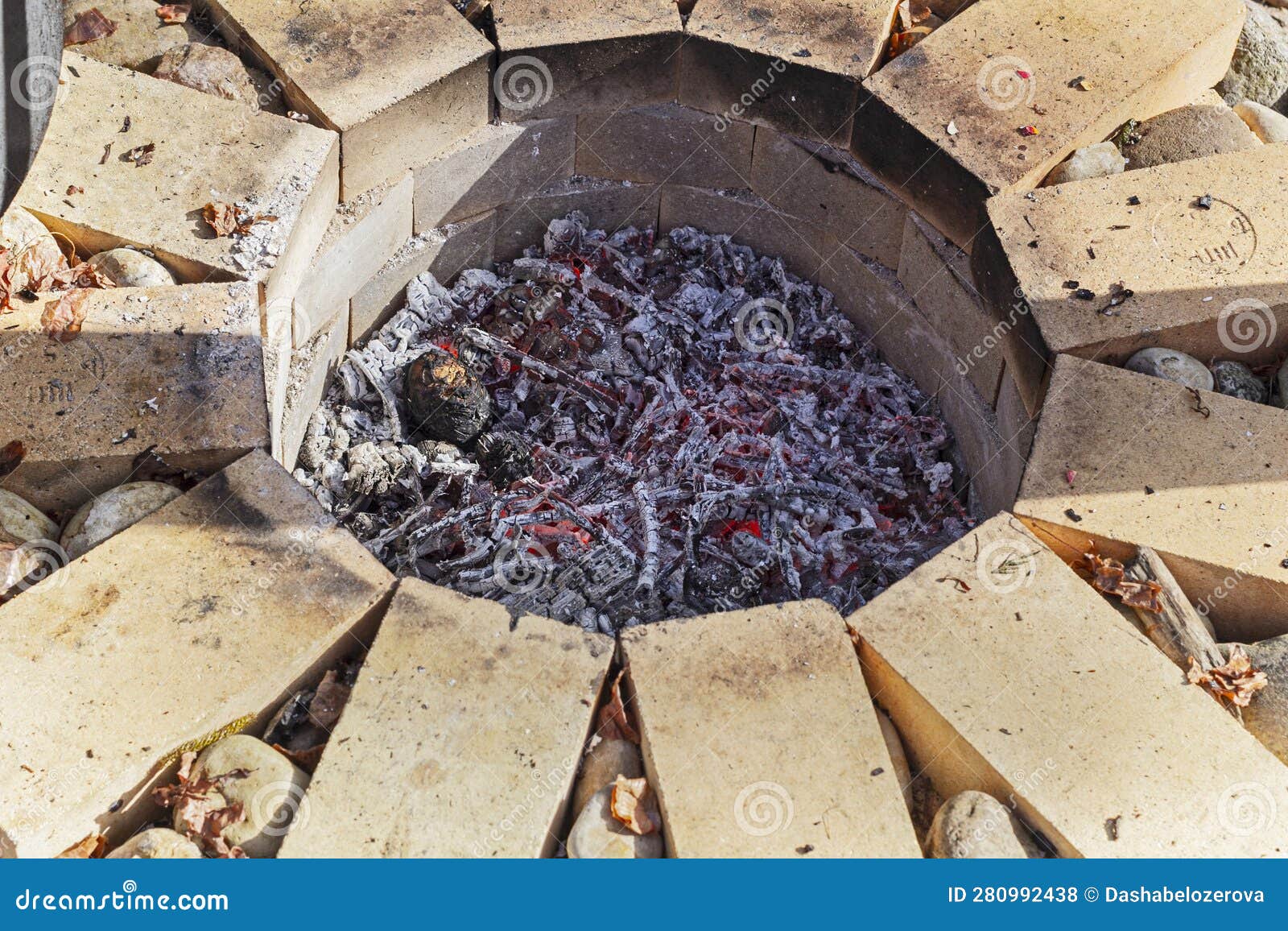 Embers of Fire in Circle of Bricks Stock Photo - Image of burning ...