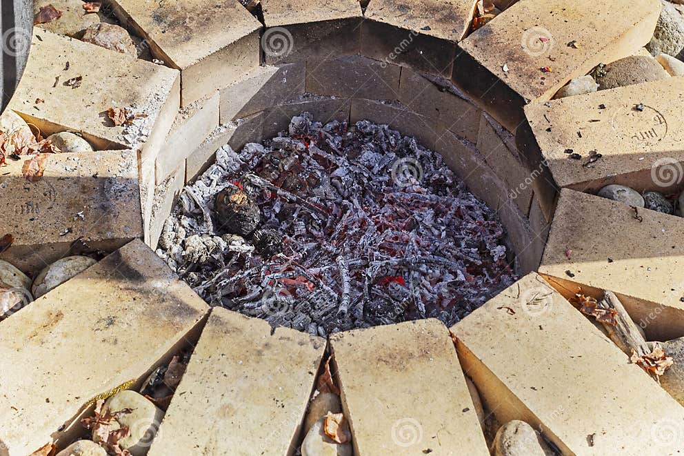 Embers of Fire in Circle of Bricks Stock Photo - Image of burning ...
