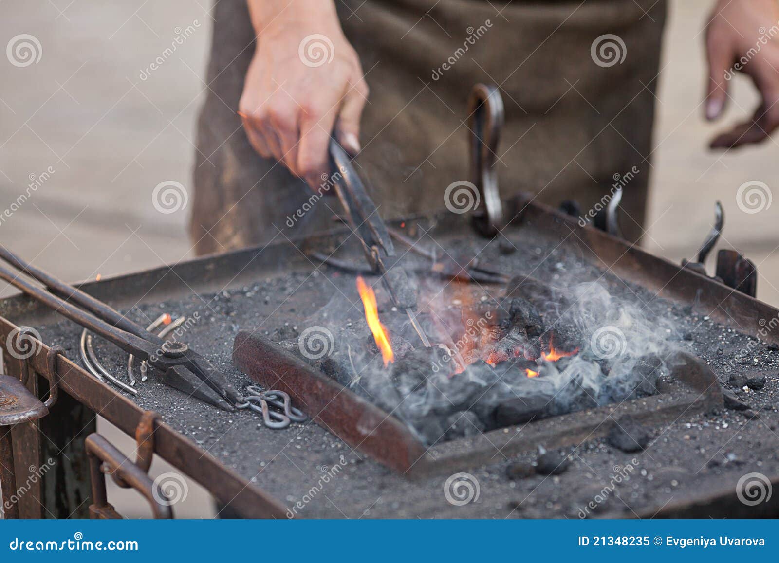 Embers, Smoke, Tools and the Hands of a Blacksmith Stock Image - Image ...