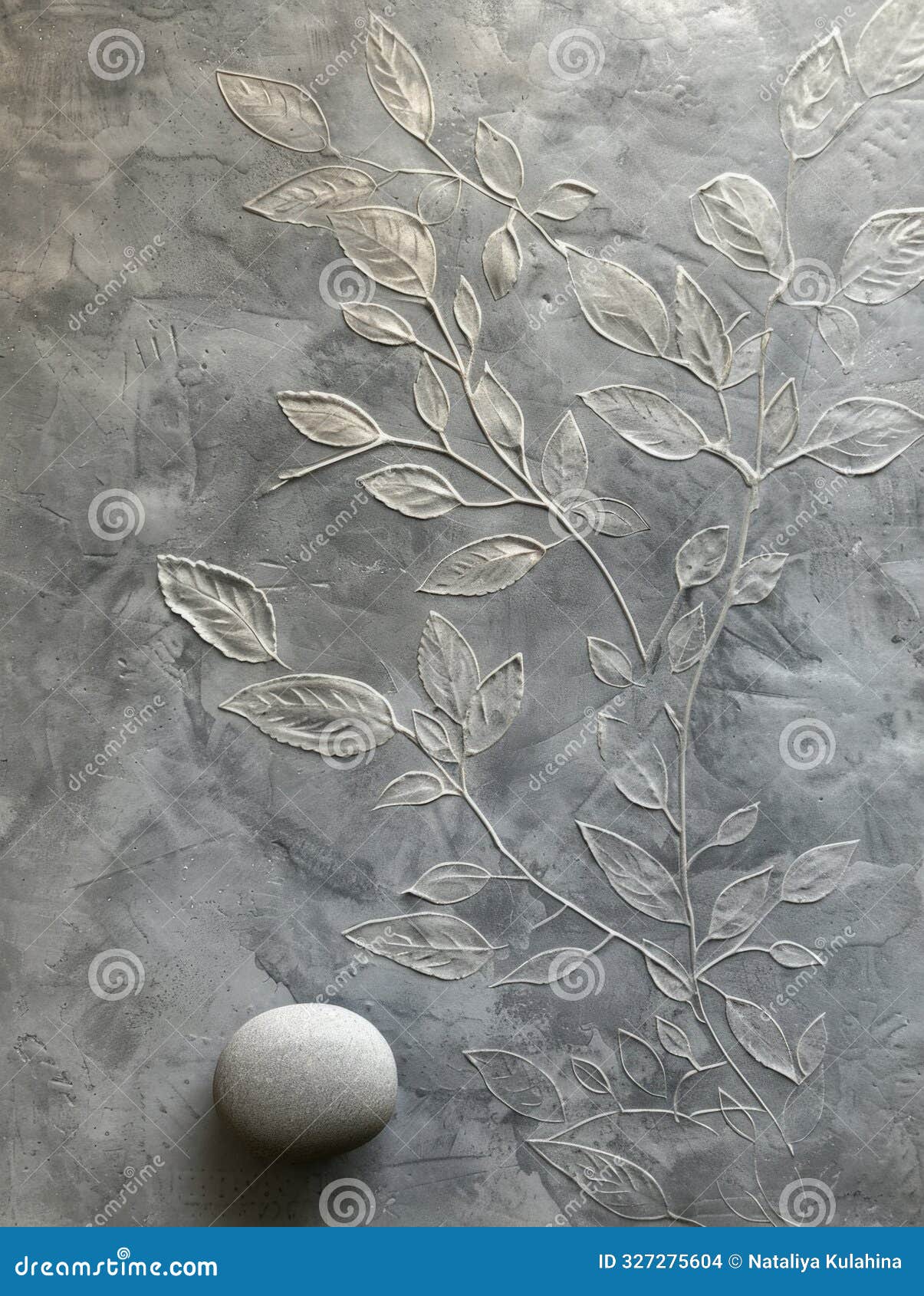 Embossed Leaves on Grey Concrete with a Round Stone Stock Photo - Image ...