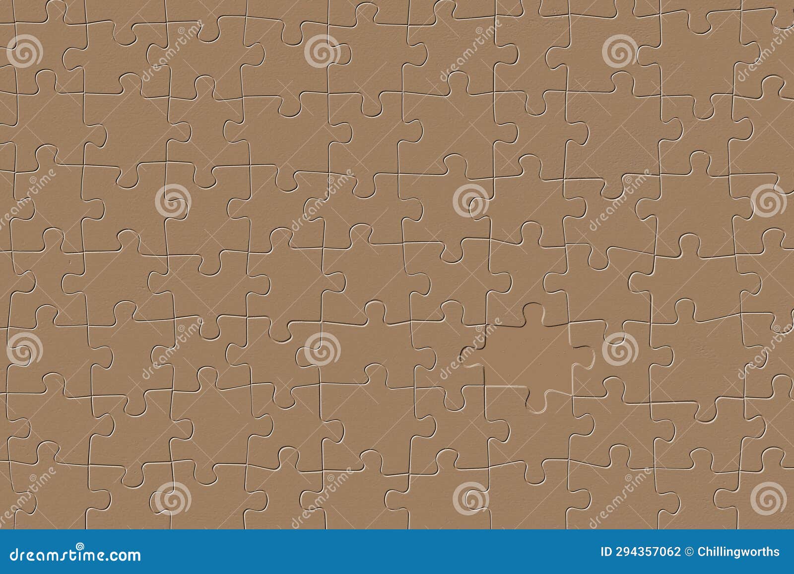 Embossed, Missing Piece of a Light Brown Jigsaw Puzzle Stock Photo ...