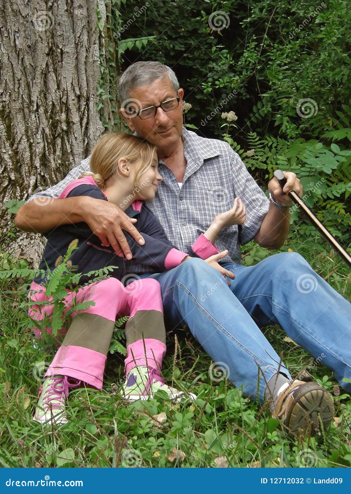 Embraced Granddaughter with Grandfather Stock Photo - Image of ...