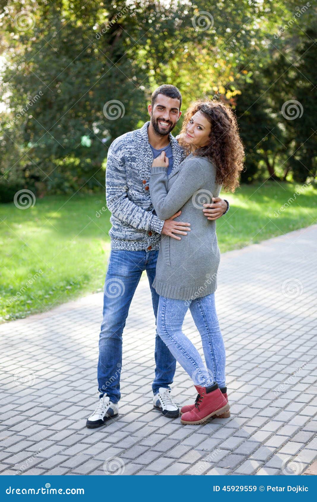 Embraced Young Couple in the Park Stock Image - Image of male, healthy ...