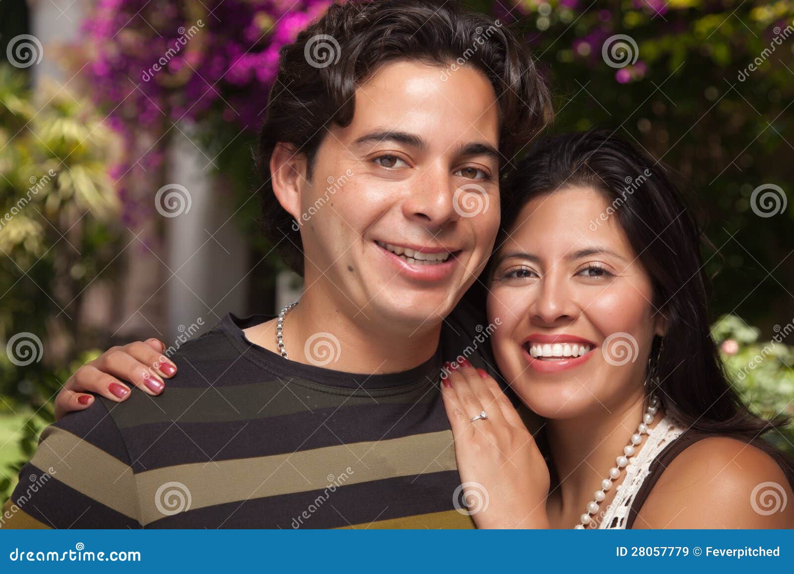 Embracing Attractive Hispanic Couple at the Park Stock Image - Image of ...
