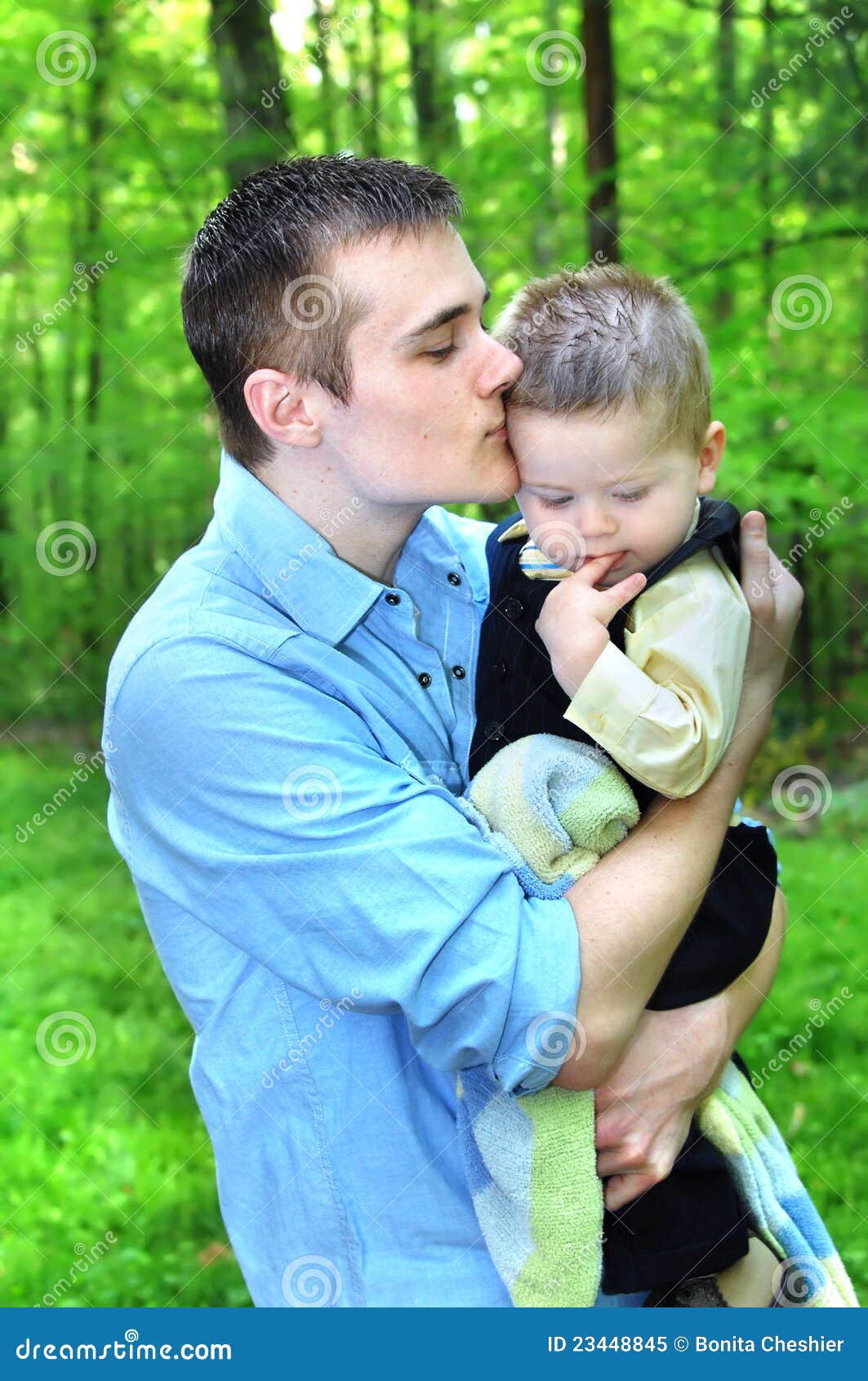 Embracing a child stock image. Image of adult, cuddling - 23448845