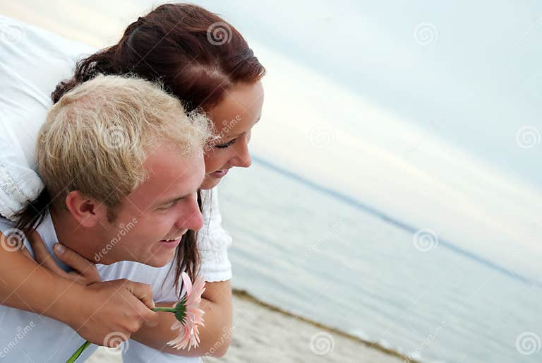 Embracing Partners on Beach Stock Image - Image of portrait, pretty ...
