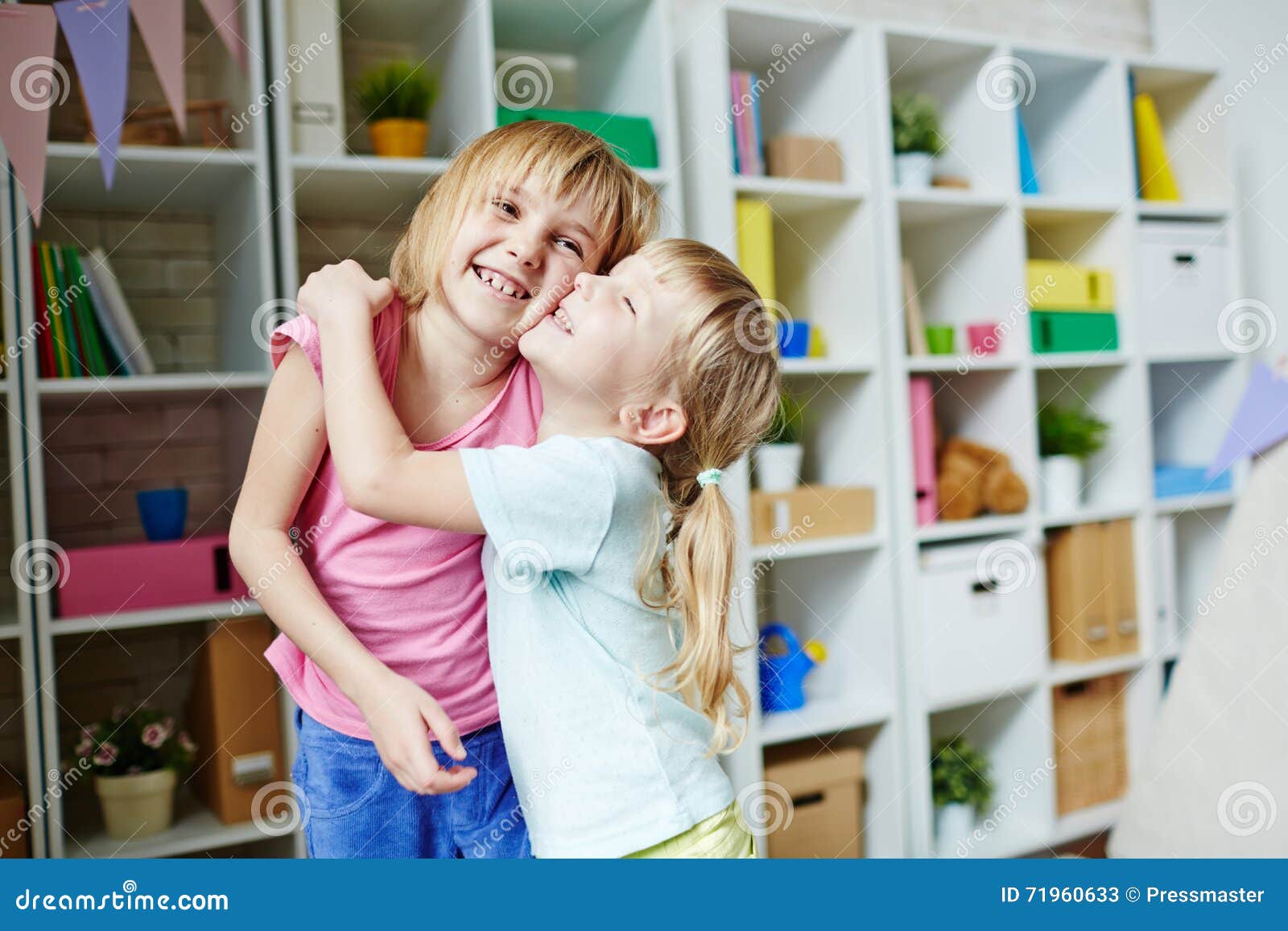Embracing sister stock image. Image of portrait, carefree - 71960633