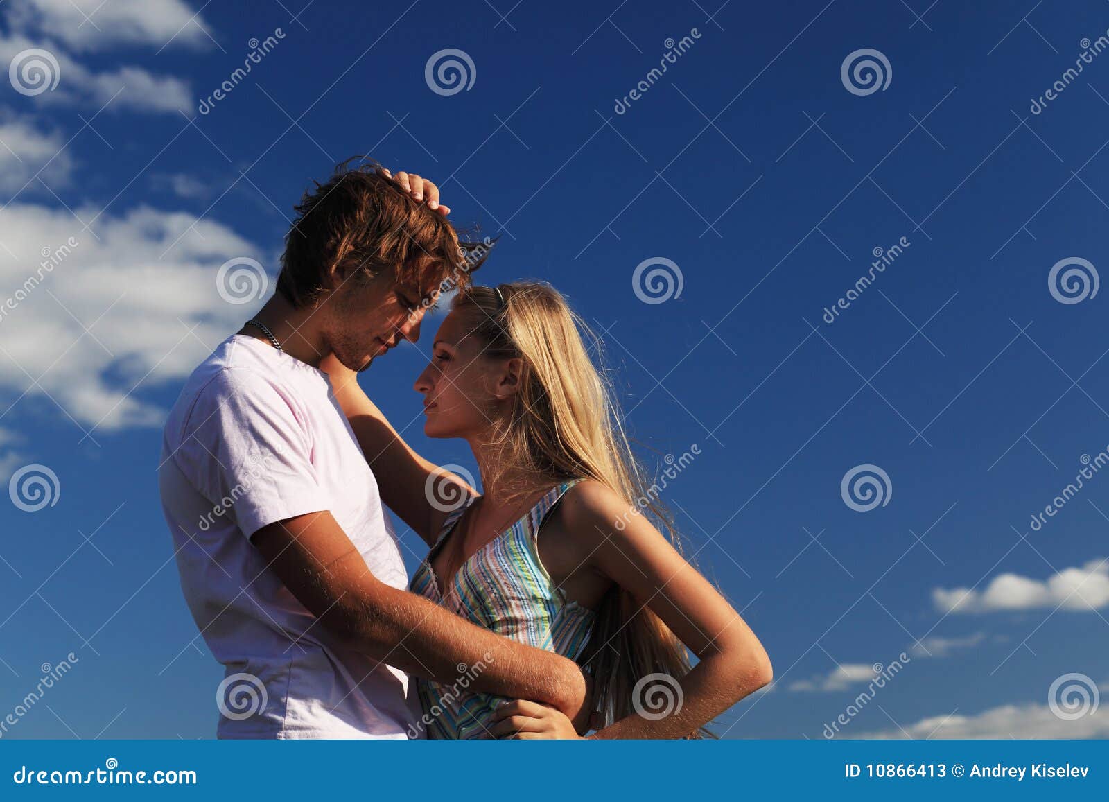 Embracing young people stock image. Image of outdoors - 10866413