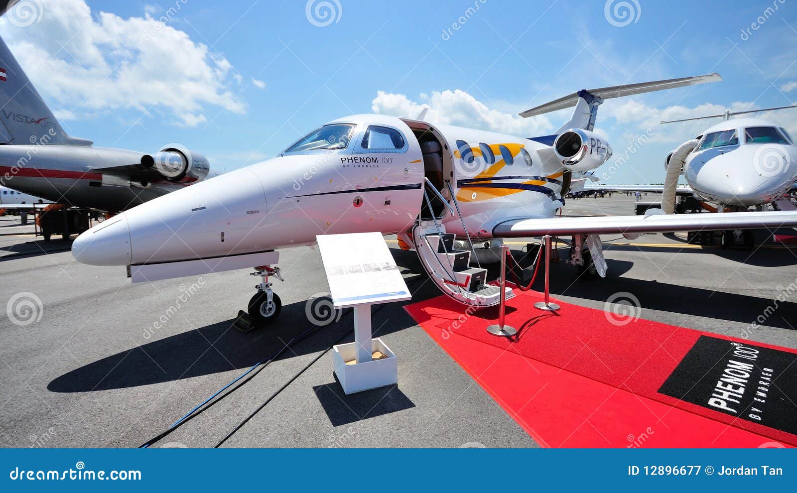 Embraer Phenom 100 at Singapore Airshow Editorial Photography - Image ...