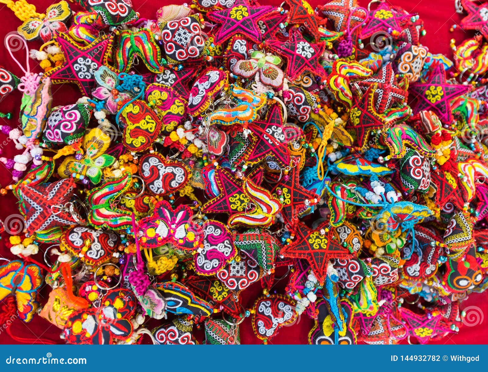 Many Embroidered Trinkets As Background Stock Photo - Image of heap ...