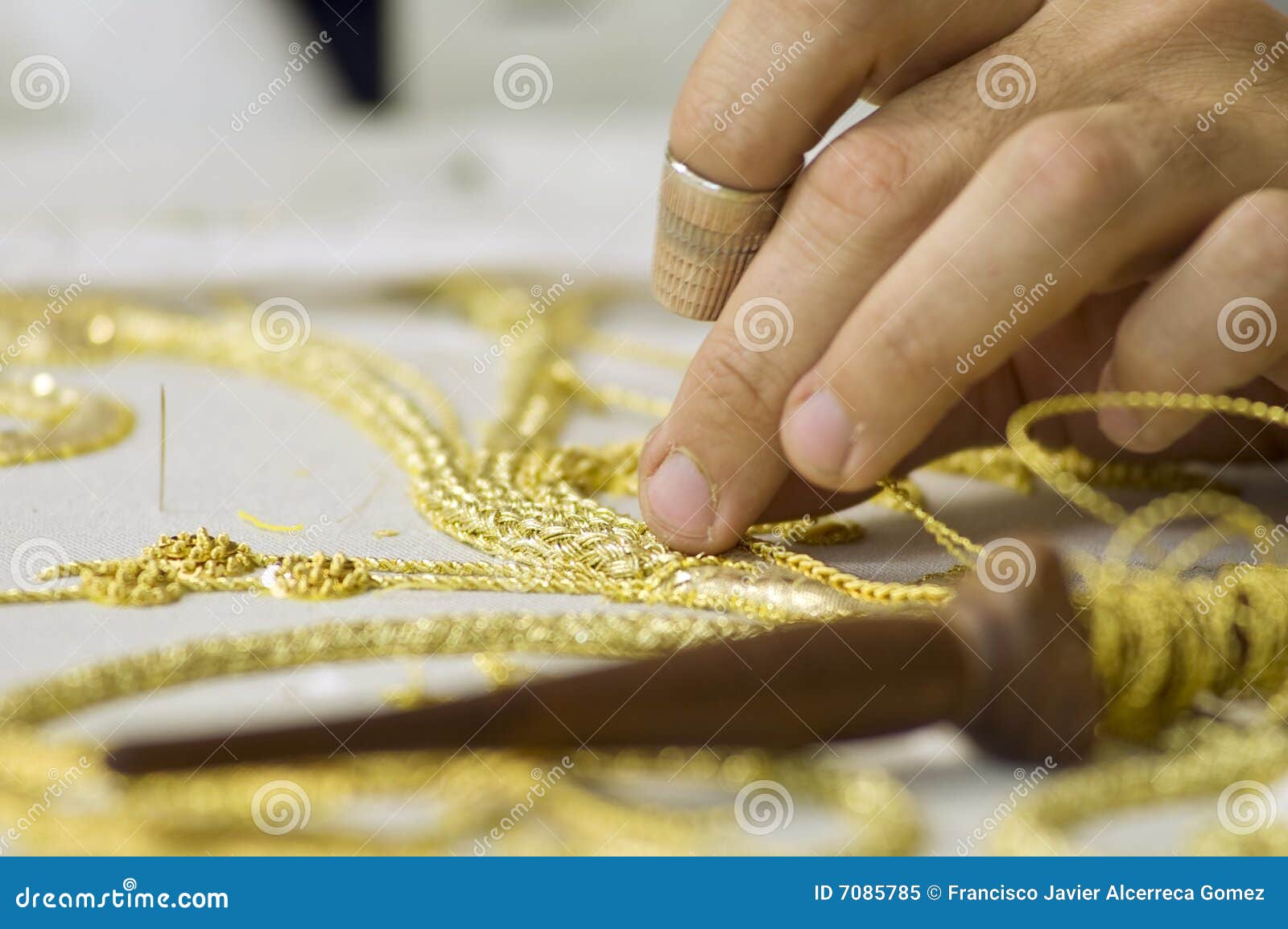 Embroidery in gold stock image. Image of woman, colors - 7085785