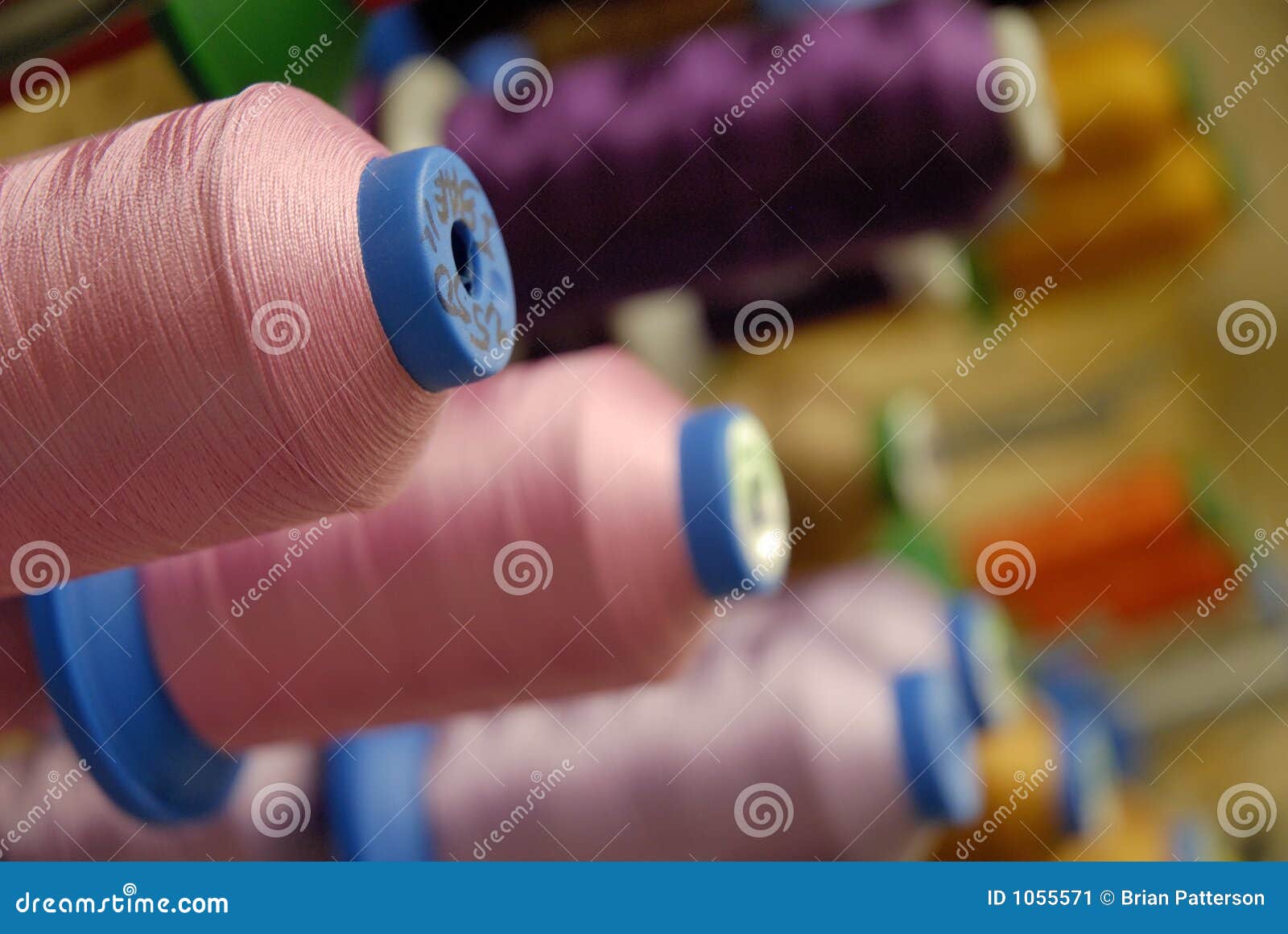 Embroidery Thread Bobbin stock image. Image of stitching - 1055571