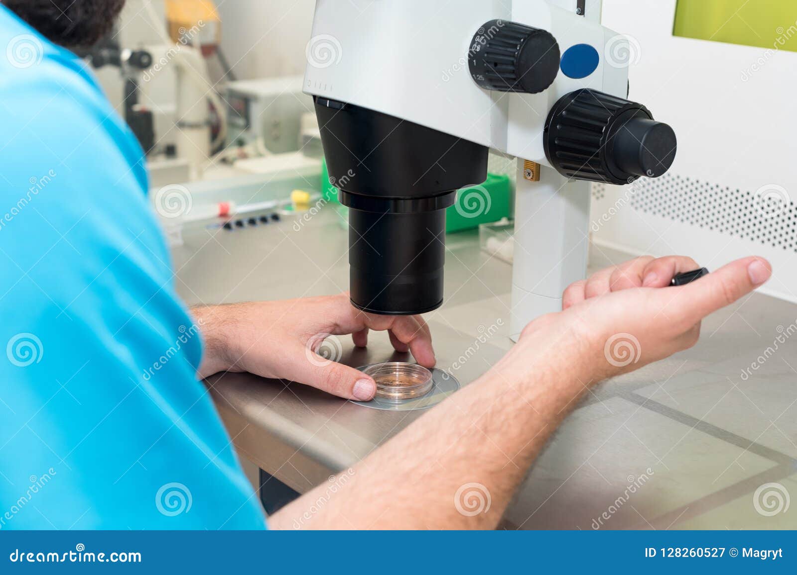 Embryologist Or Lab Technician Working With Human Egg Under The ...