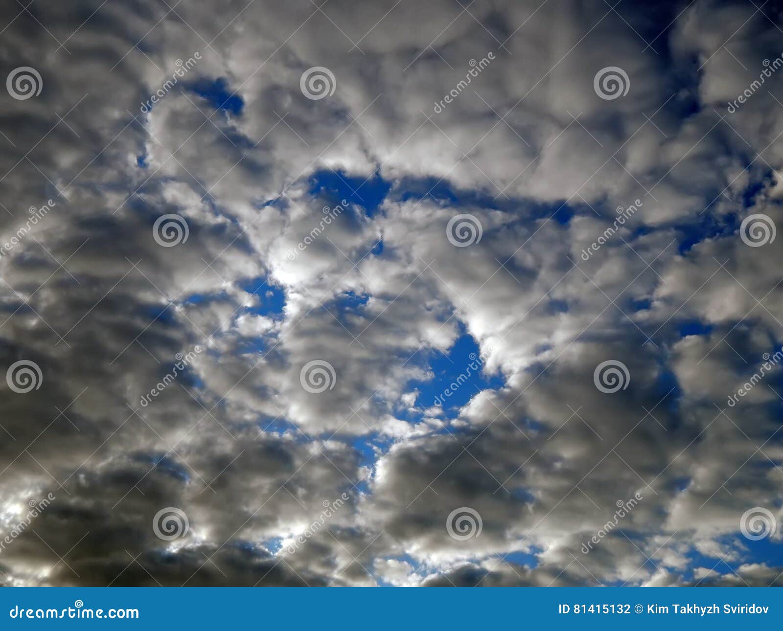 The Emergence of the Sun from the Clouds in the Sky Stock Photo - Image ...