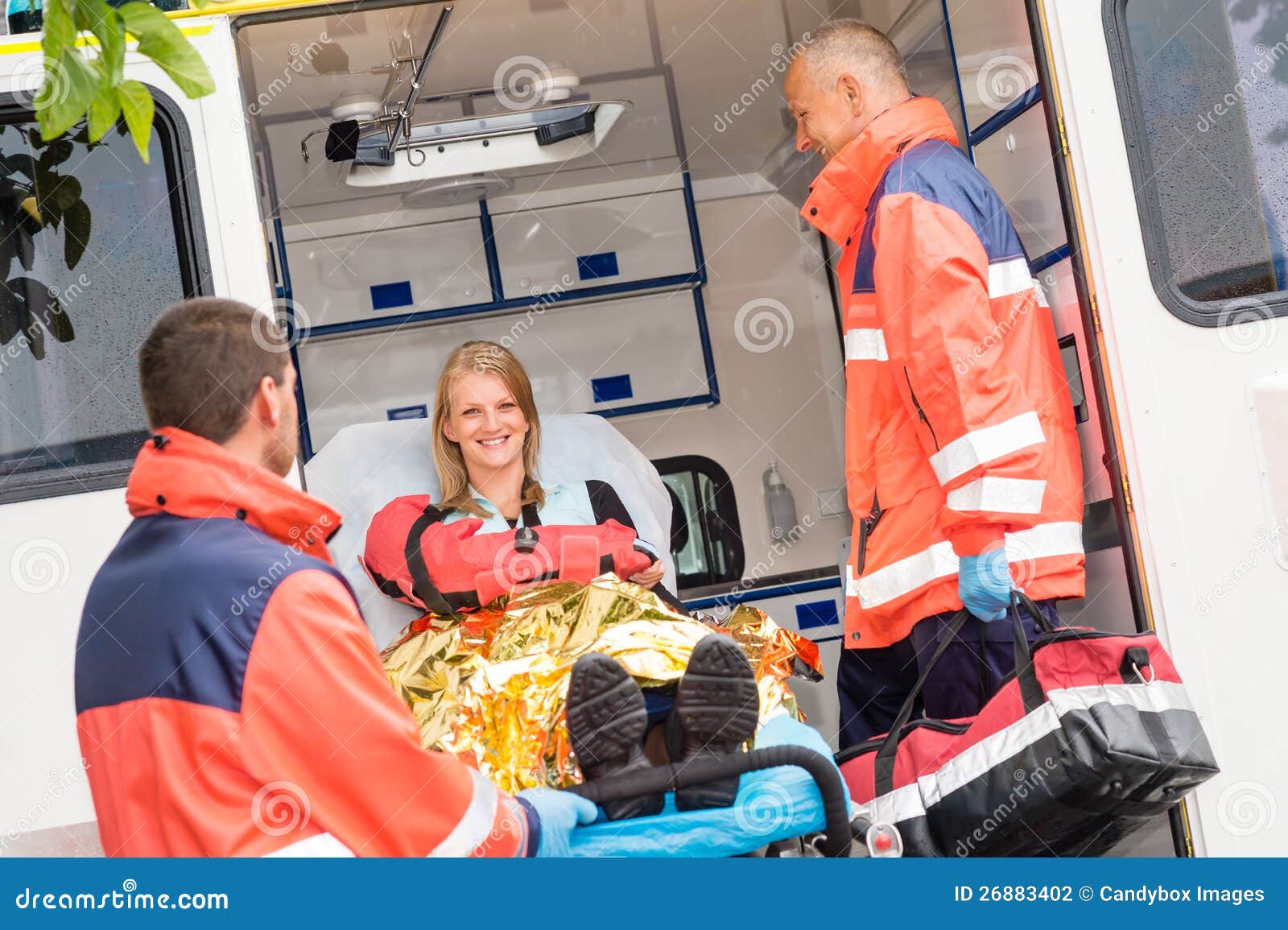 Emergency Doctor with Woman in Ambulance Stock Photo - Image of doctors ...