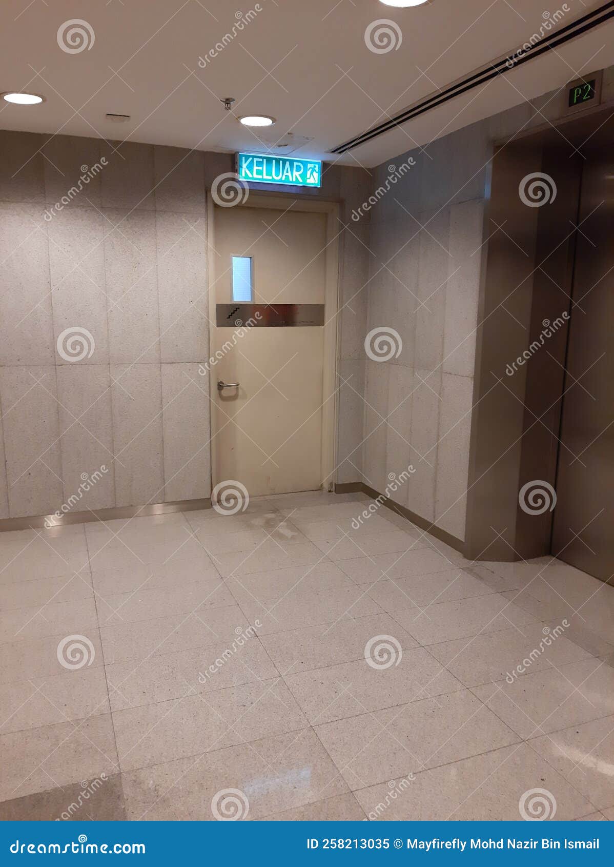The Emergency Door or Exit is Next To the Elevator Stock Image - Image ...