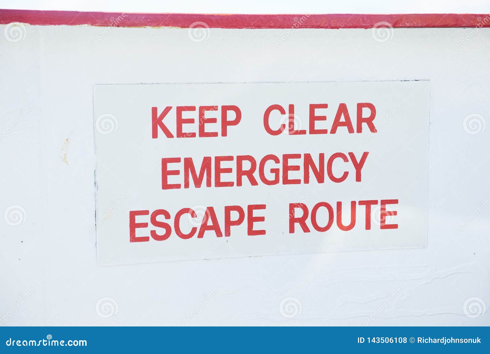 Emergency Escape Route Sign Stock Photo - Image of facade, colour ...
