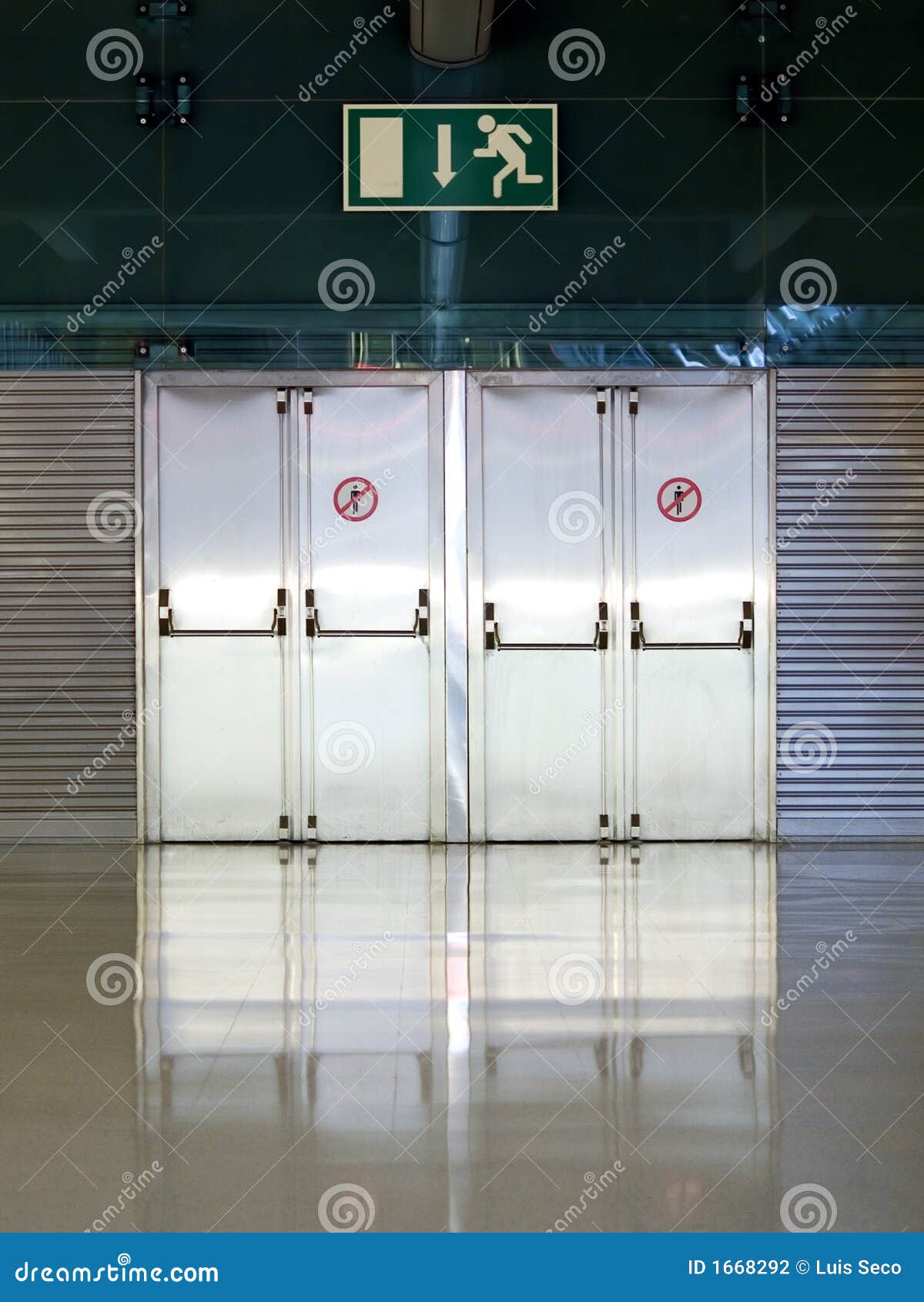 Emergency Exit,fire Alarm,Fire Exit Sign And In The Blurred Background ...