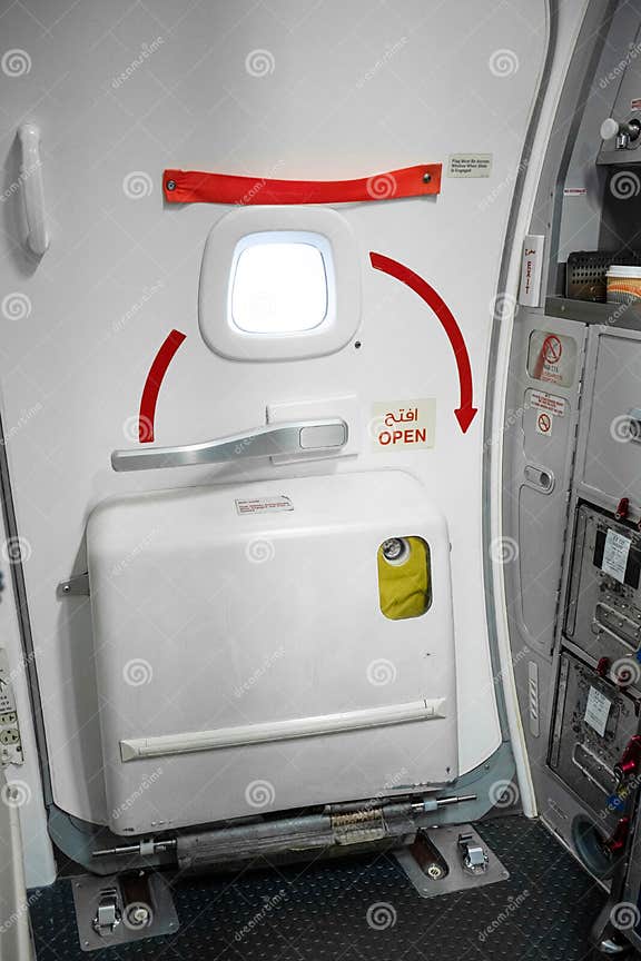 Emergency Exit Door in an Airplane Close Up Editorial Photo - Image of ...