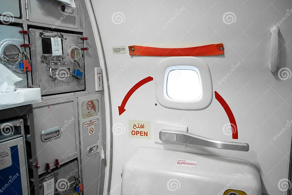 Emergency Exit Door in an Airplane Close Up Stock Image - Image of ...