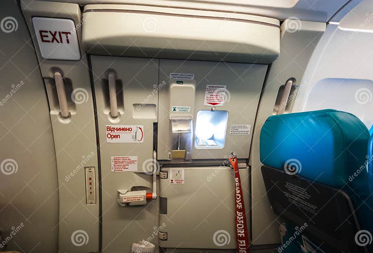 Emergency Exit Door in Airplane Stock Image - Image of doorway ...