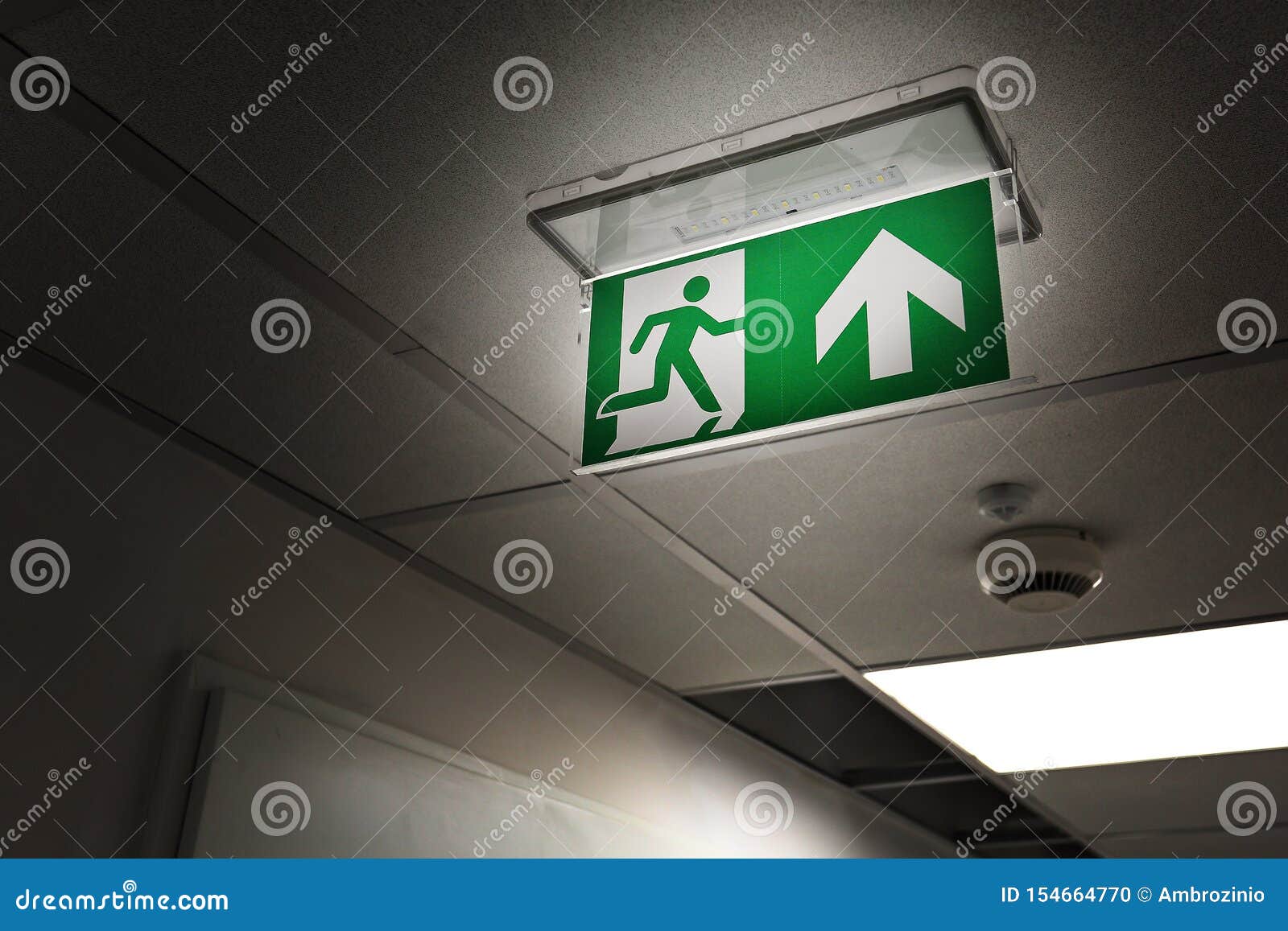 Emergency Exit at Night in Office Stock Photo - Image of home, exit ...