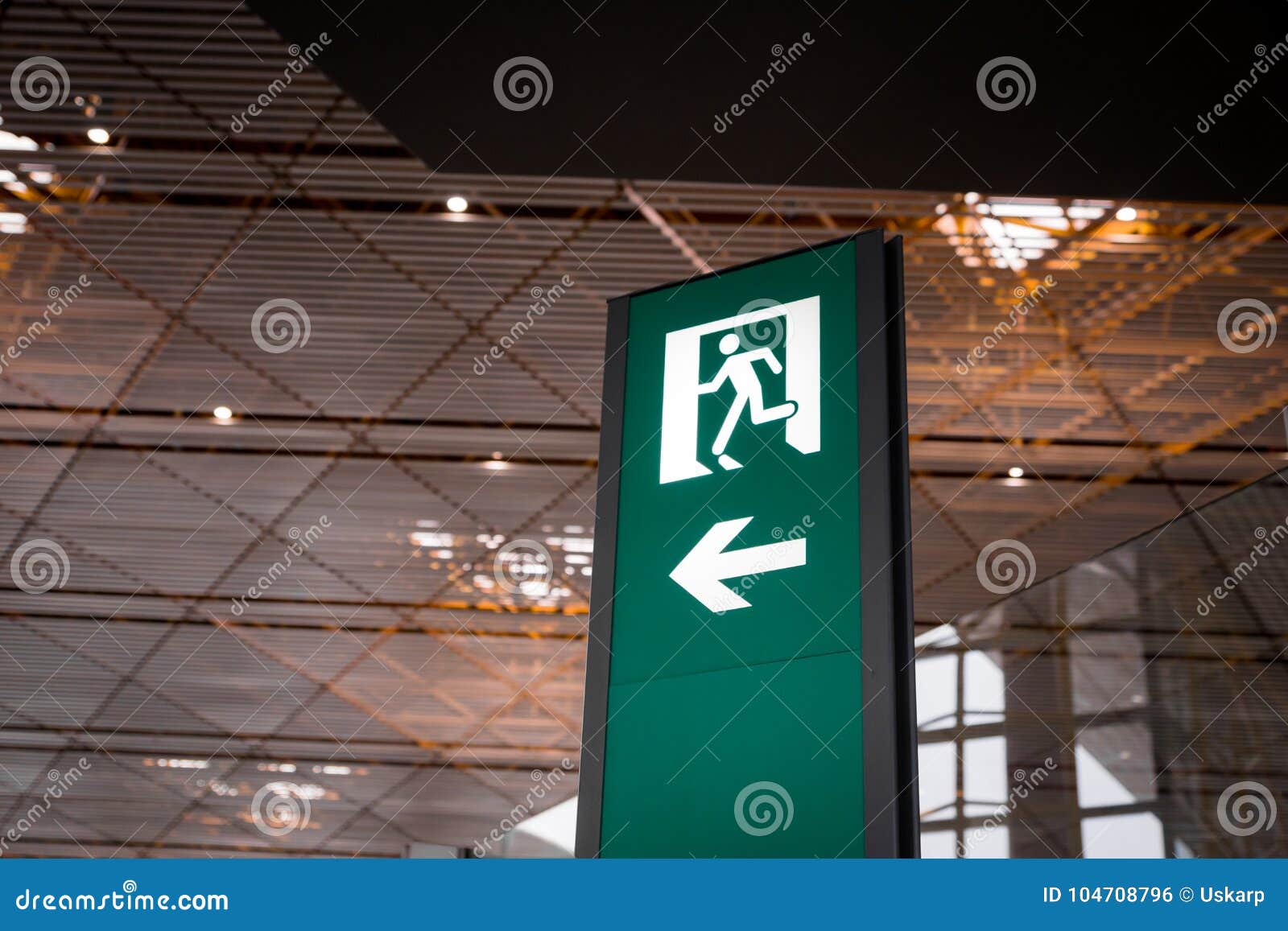 Emergency Exit Sign at Airport Stock Photo - Image of exit, escape ...