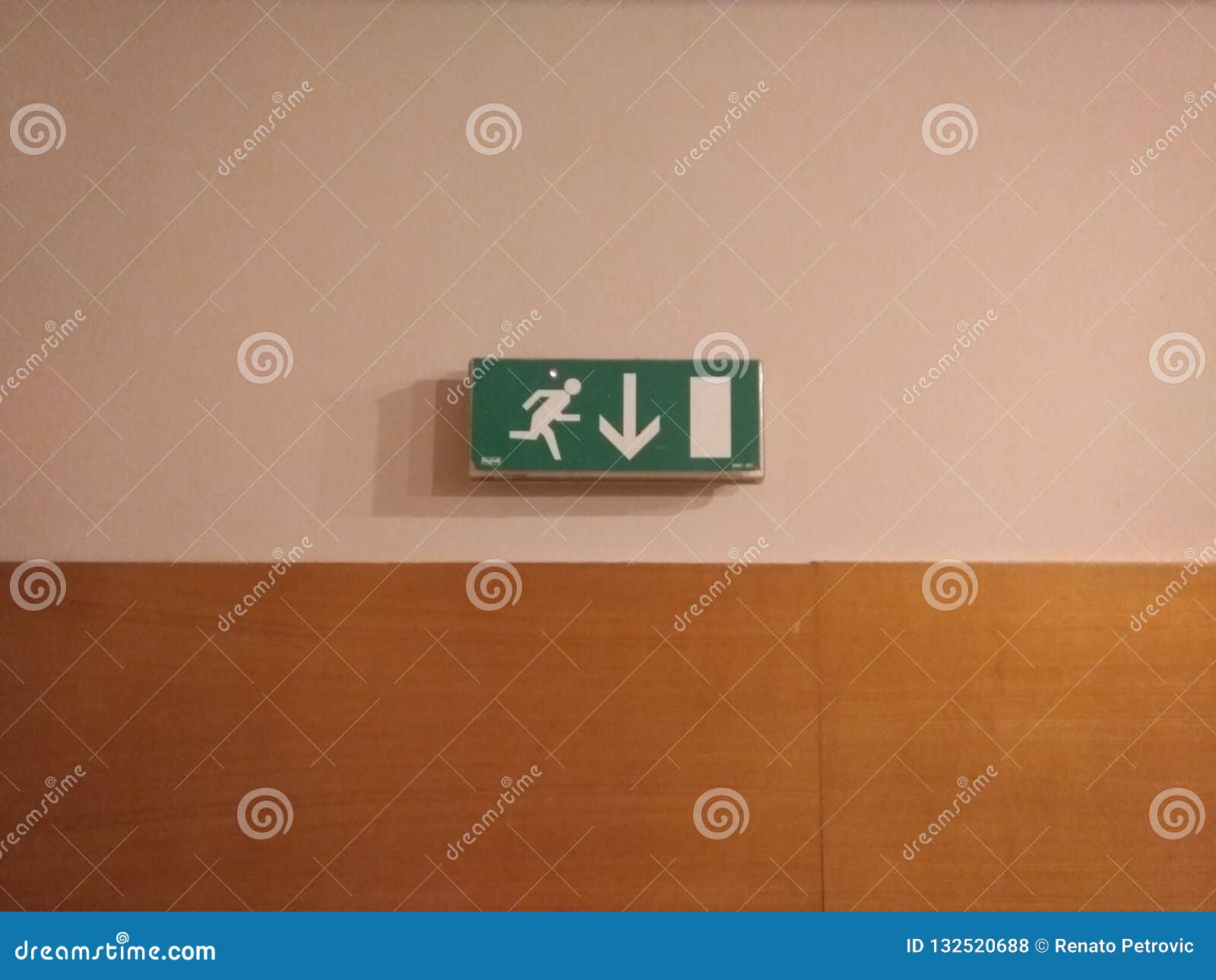 Exit sign on wall stock photo. Image of safety, sign - 132520688