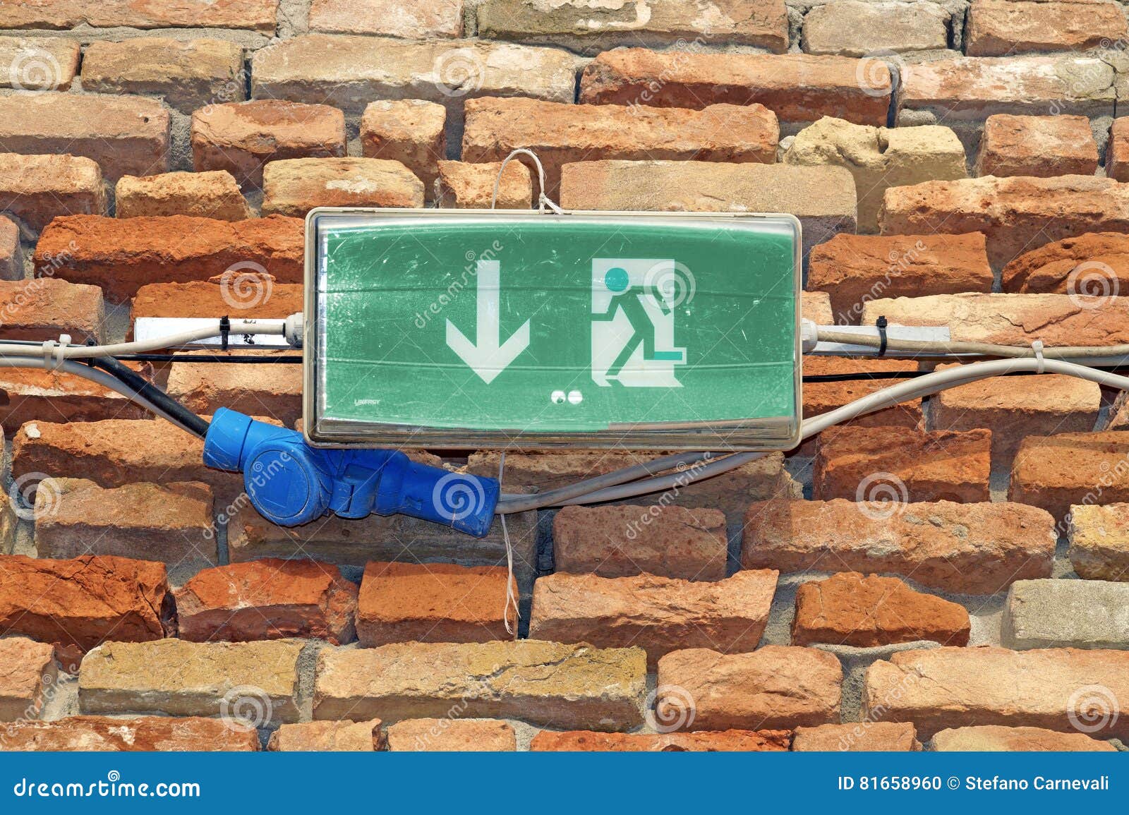 Emergency Exit Sign in a Building Stock Photo - Image of night, sign ...