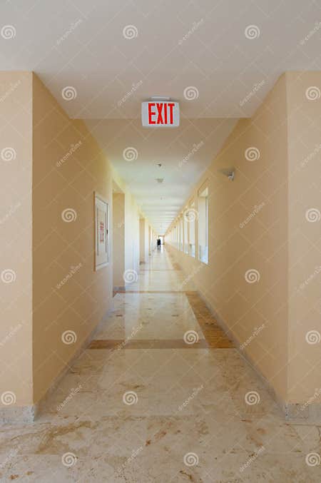 Emergency Exit Sign in Hallway Stock Image - Image of interior, hallway ...