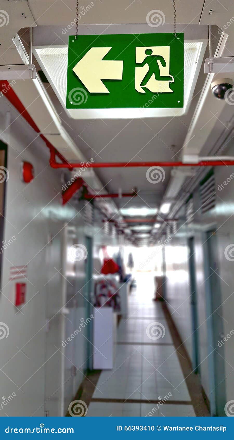 Emergency Exit Sign in Hallway of Apartment Stock Photo - Image of ...